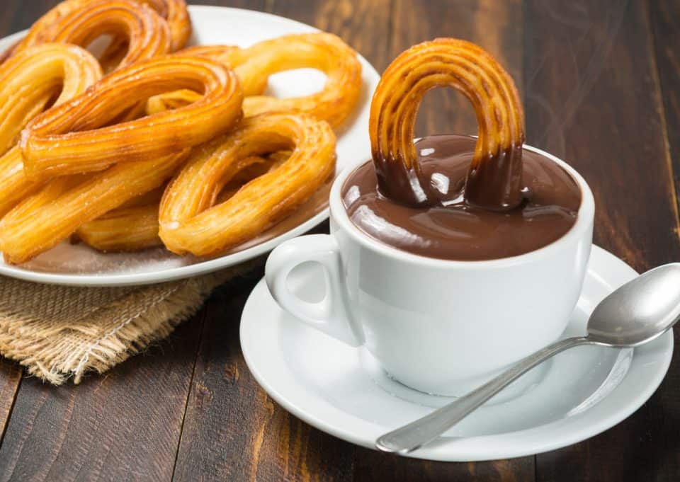 How Spaniards Make Churros So Crispy (And Why The Chocolate Matters)
